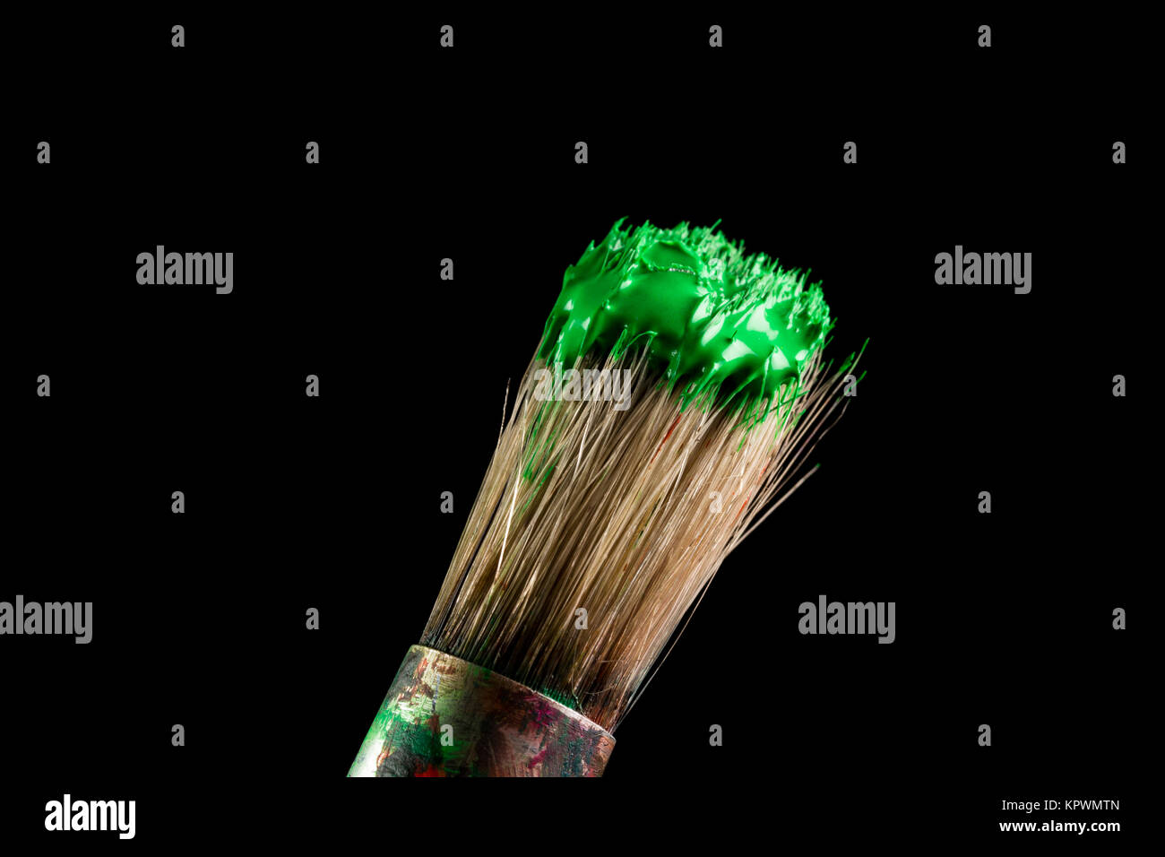 paint brush painting with green color Stock Photo - Alamy