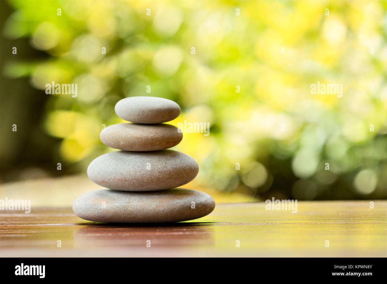 Pile of balancing pebble stones outdoor Stock Photo - Alamy