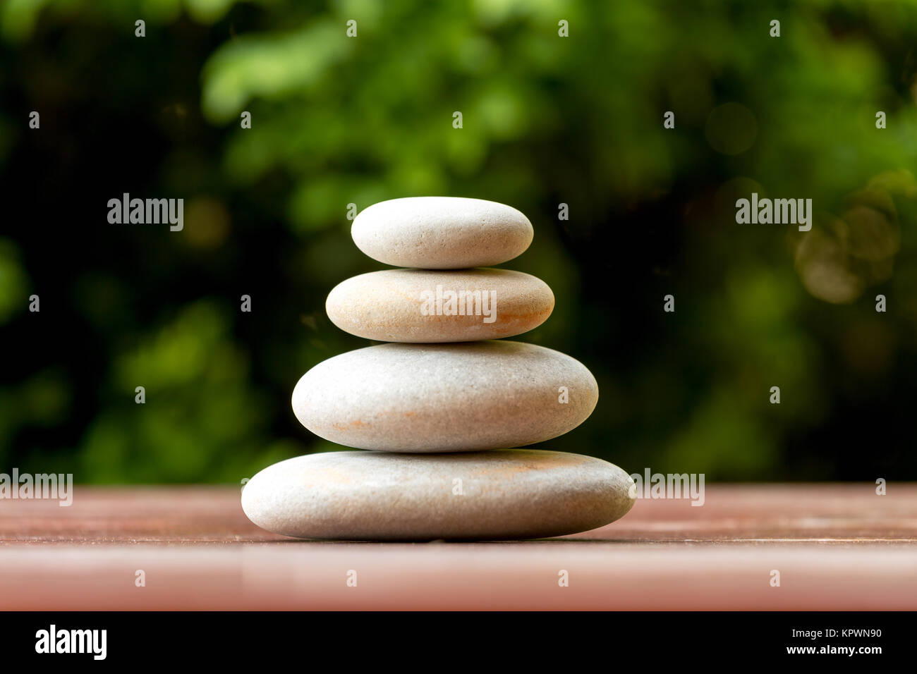 Pile of balancing pebble stones outdoor Stock Photo - Alamy