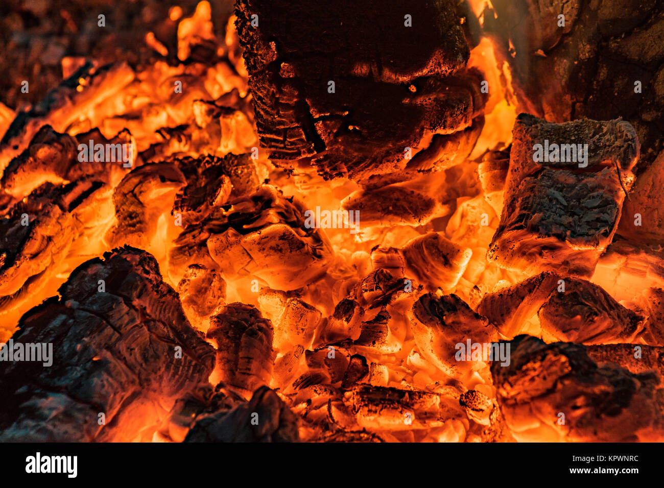 Wood fire -burning embers in close-up Stock Photo - Alamy
