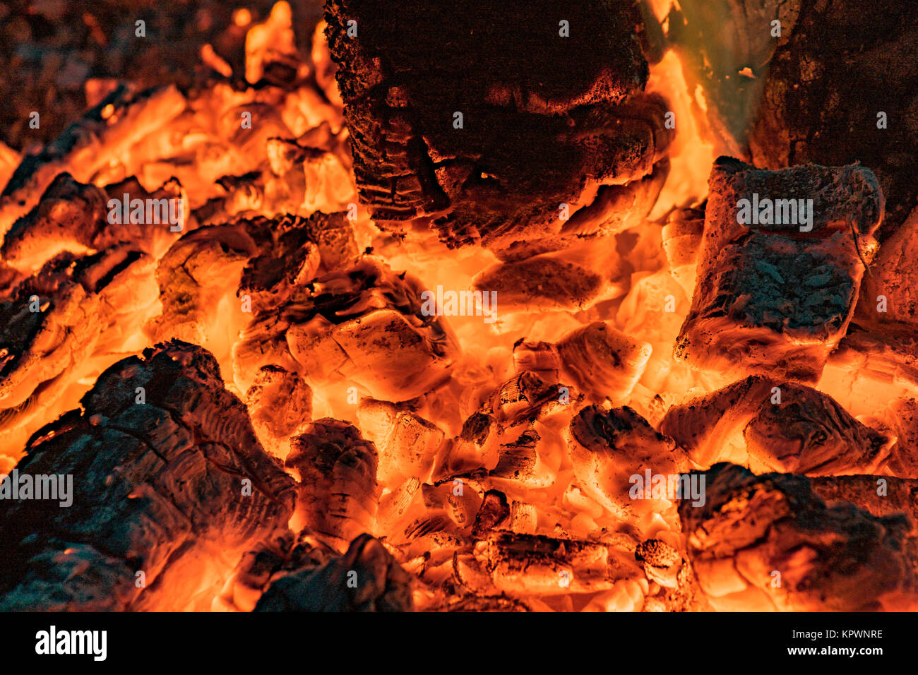 Wood fire -burning embers in close-up Stock Photo - Alamy