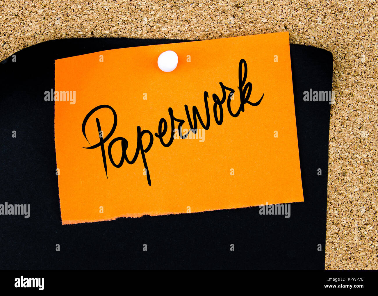 Paperwork written on orange paper note Stock Photo - Alamy