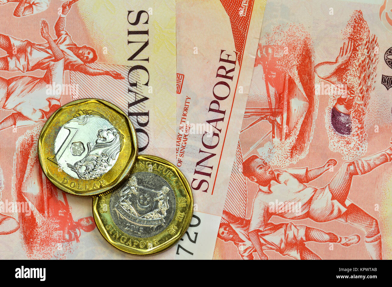 Singapore money on white background Stock Photo - Alamy