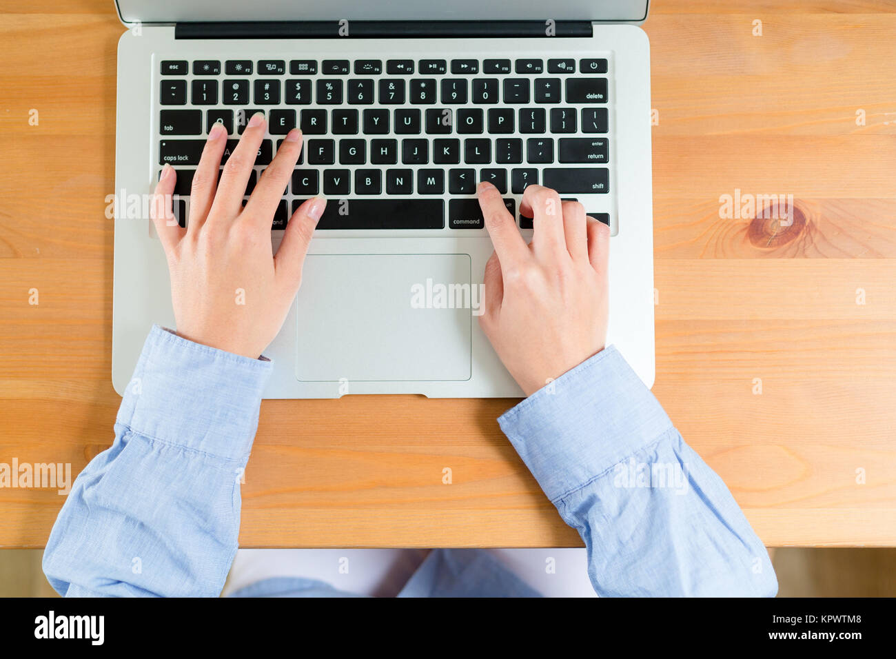 Top View of Female hands typing laptop computer Stock Photo - Alamy