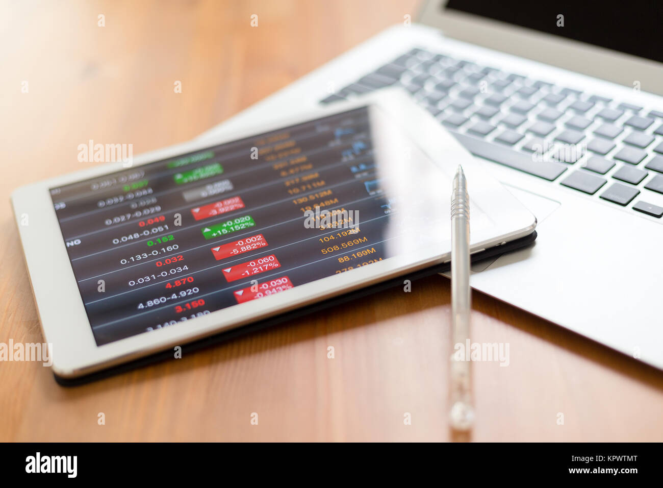 Digital stock market chart on white tablet screen Stock Photo - Alamy