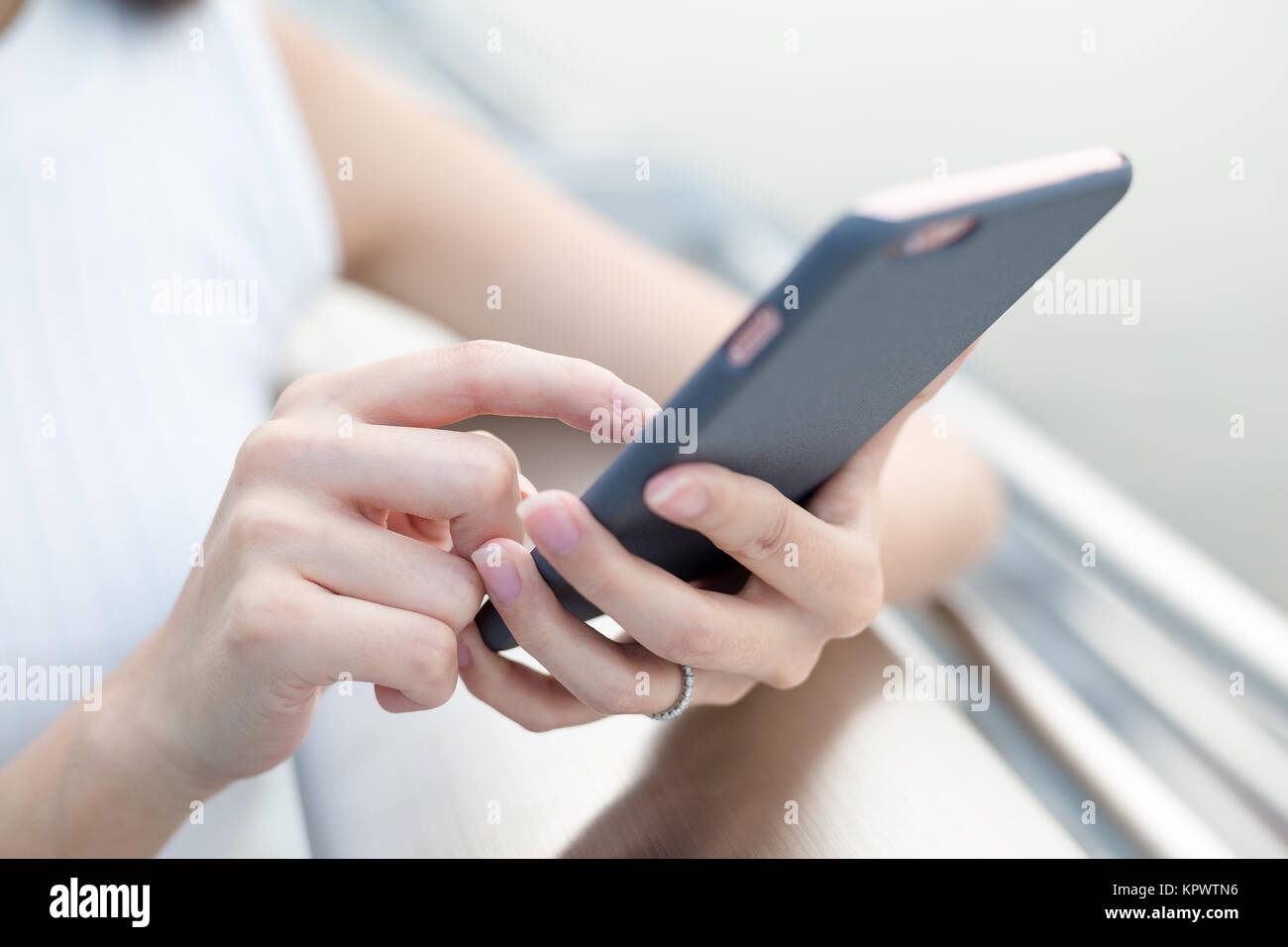 Woman sending text message on mobile phone Stock Photo - Alamy Woman sending text message on mobile phone Stock Photo - Alamy