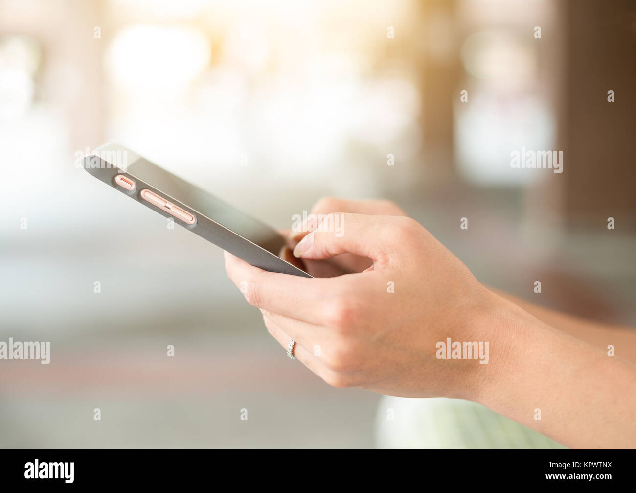 Woman touch on phone Stock Photo - Alamy