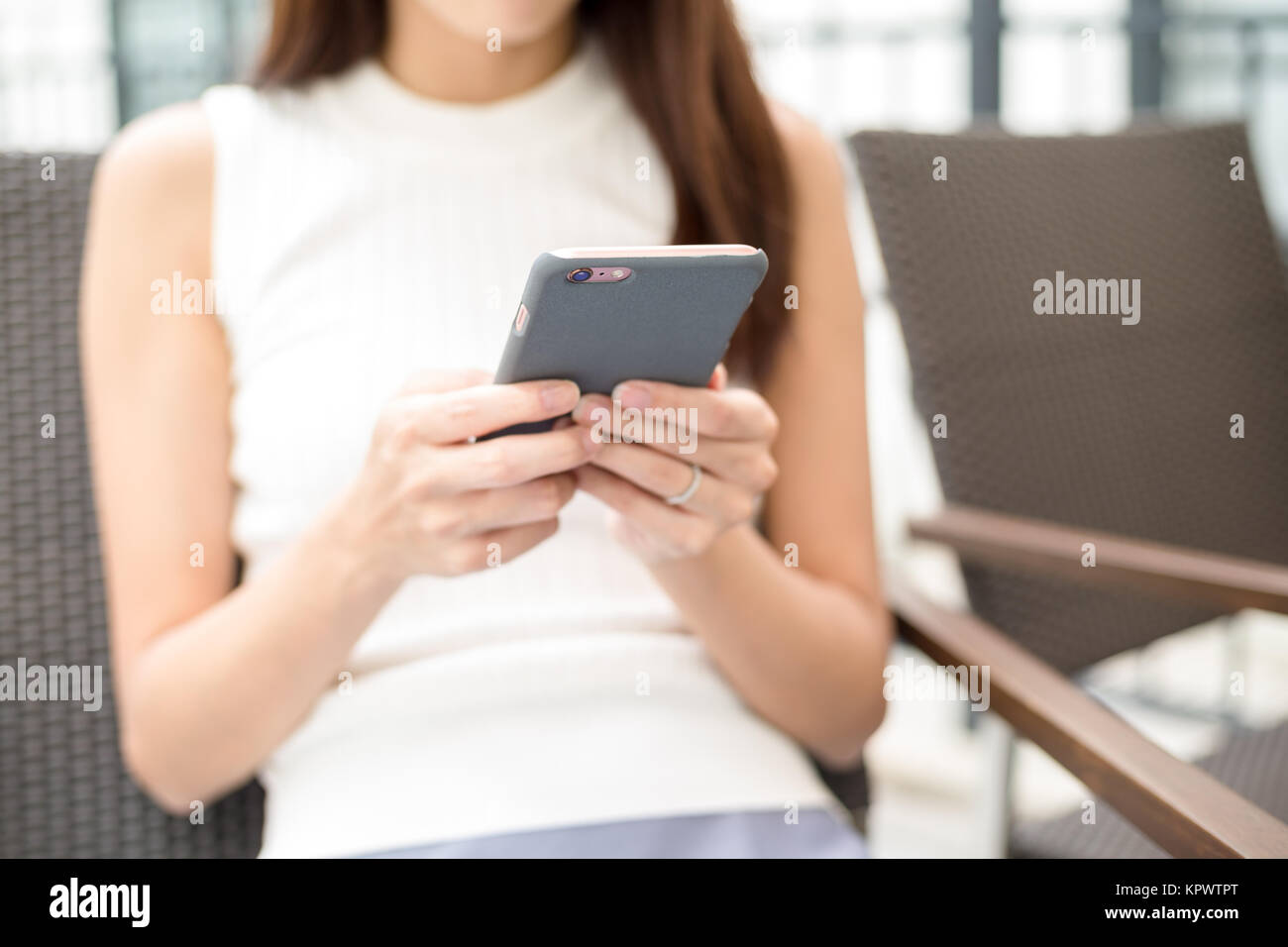 Woman browse internet on cellphone Stock Photo - Alamy