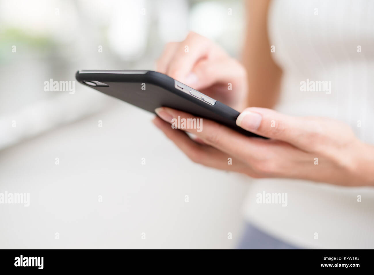 Close up of Woman use of mobile phone Stock Photo - Alamy