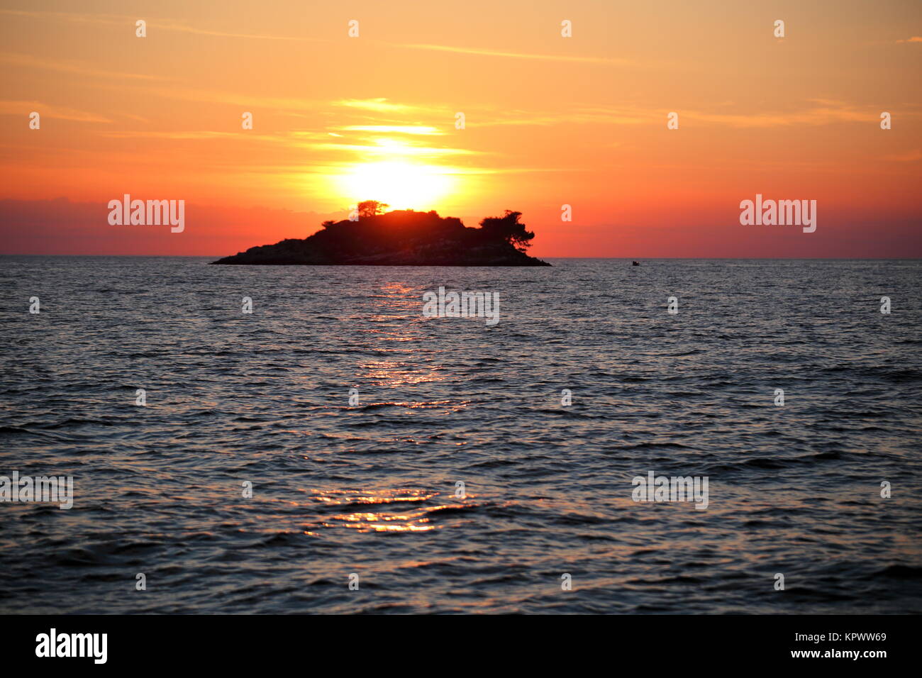 island in the sunset Stock Photo - Alamy