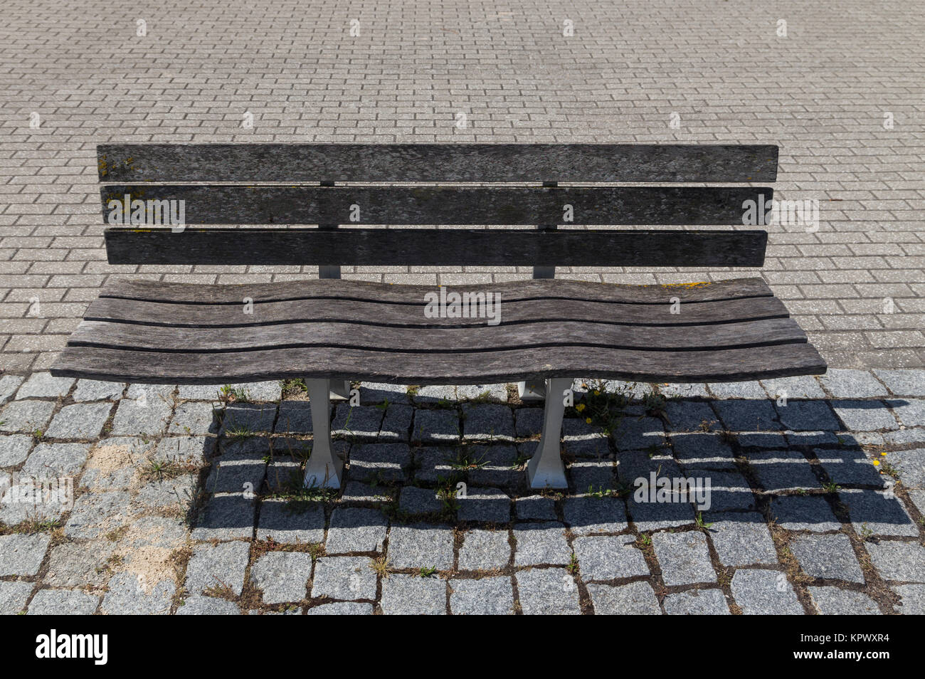 empty wooden bench on street Stock Photo - Alamy