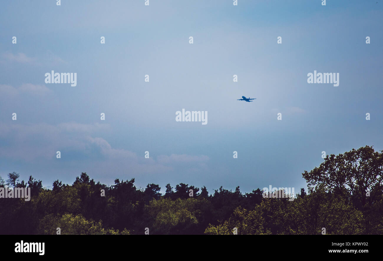 passenger plane fly up take-off Stock Photo - Alamy
