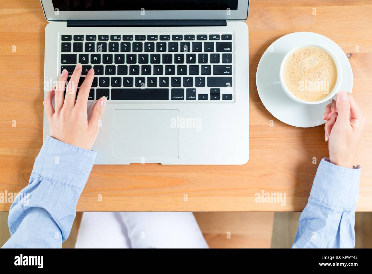 Woman use of laptop computer Stock Photo - Alamy