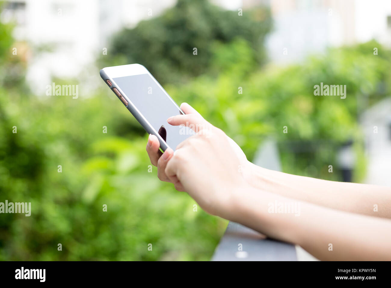 Woman texting on mobile phone Stock Photo - Alamy
