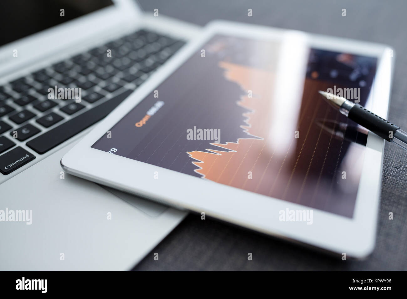 Digital stock market chart on a tablet screen Stock Photo - Alamy
