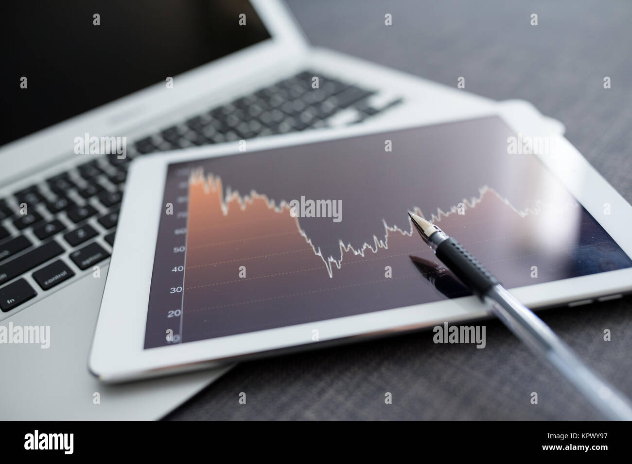 Stock market analyze with digital tablet Stock Photo - Alamy