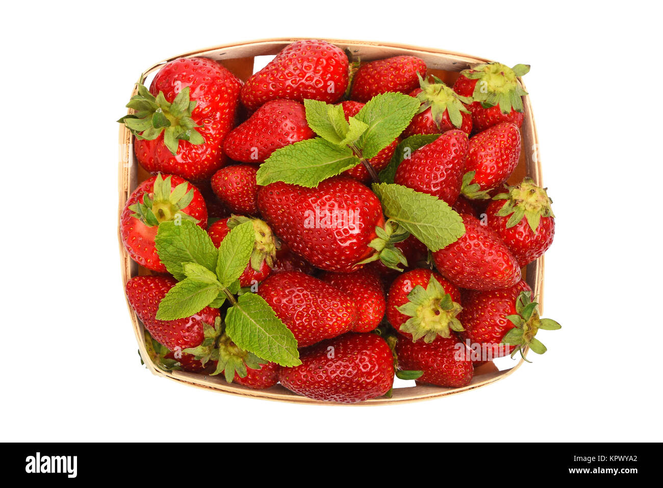 Strawberry and mint in basket isolated on white Stock Photo - Alamy