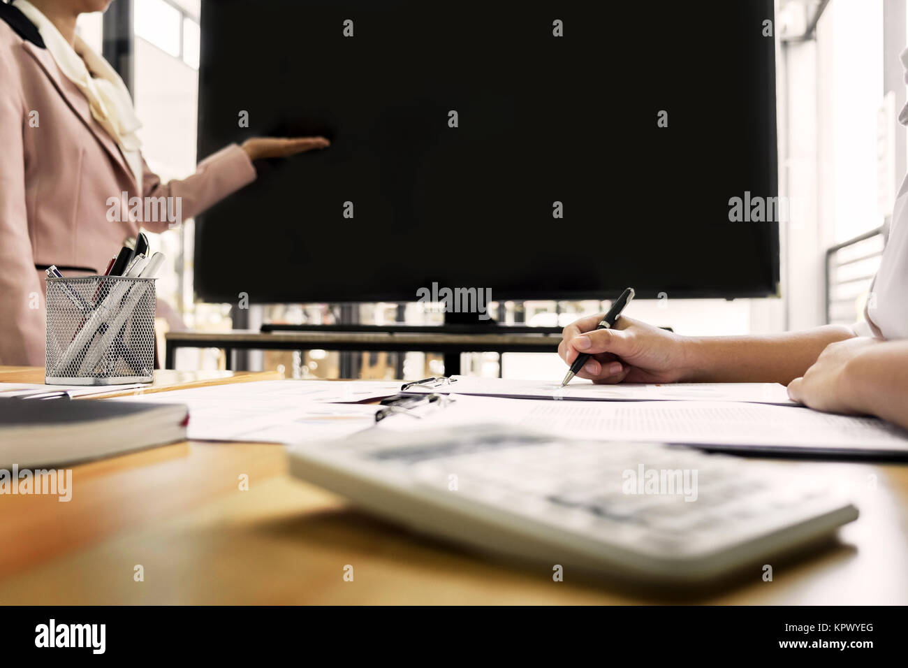 young business man working presentation using television computer Stock ...