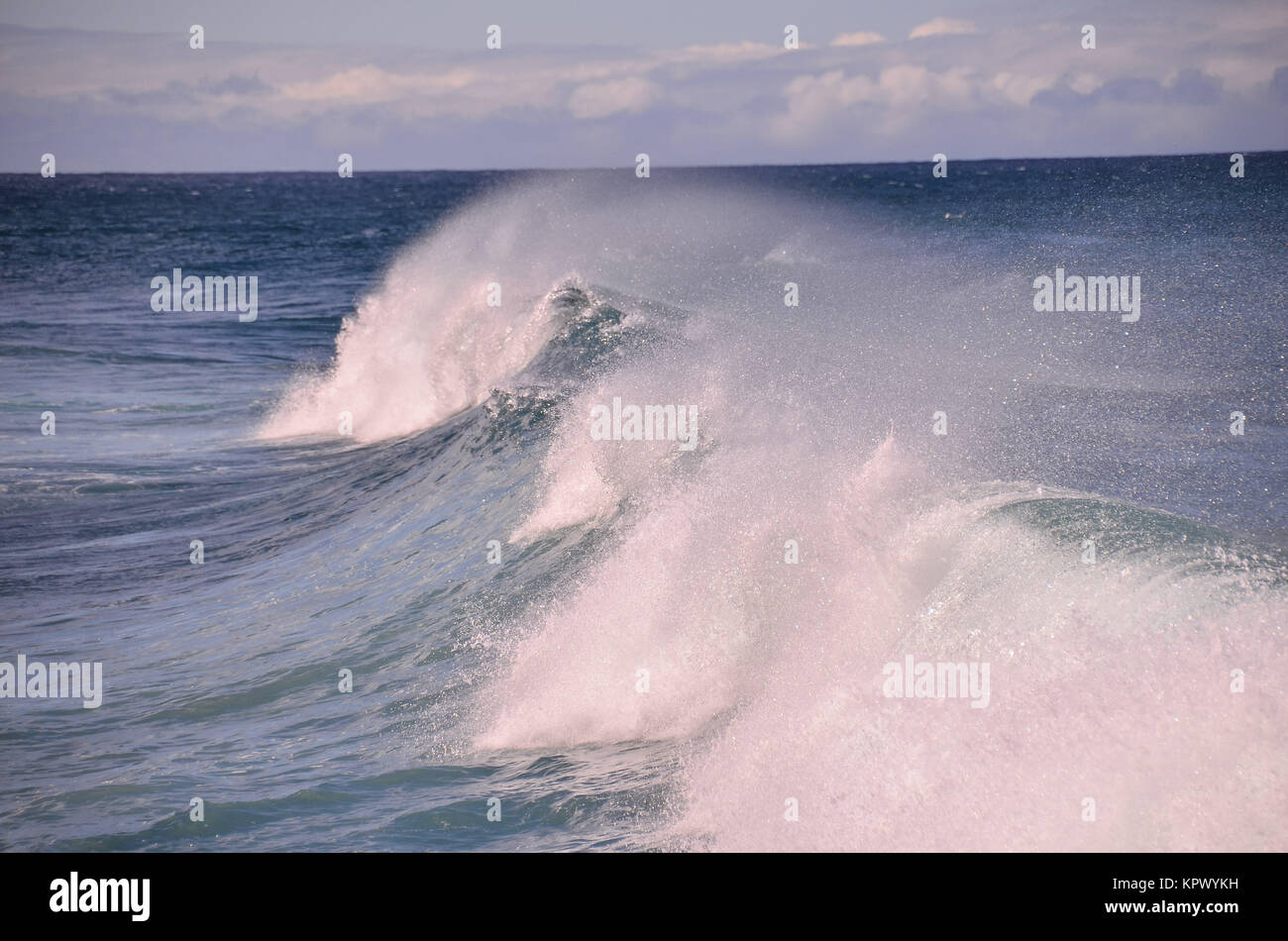 Big Blue Wave Breaks in the Atlantic Ocean Stock Photo - Alamy