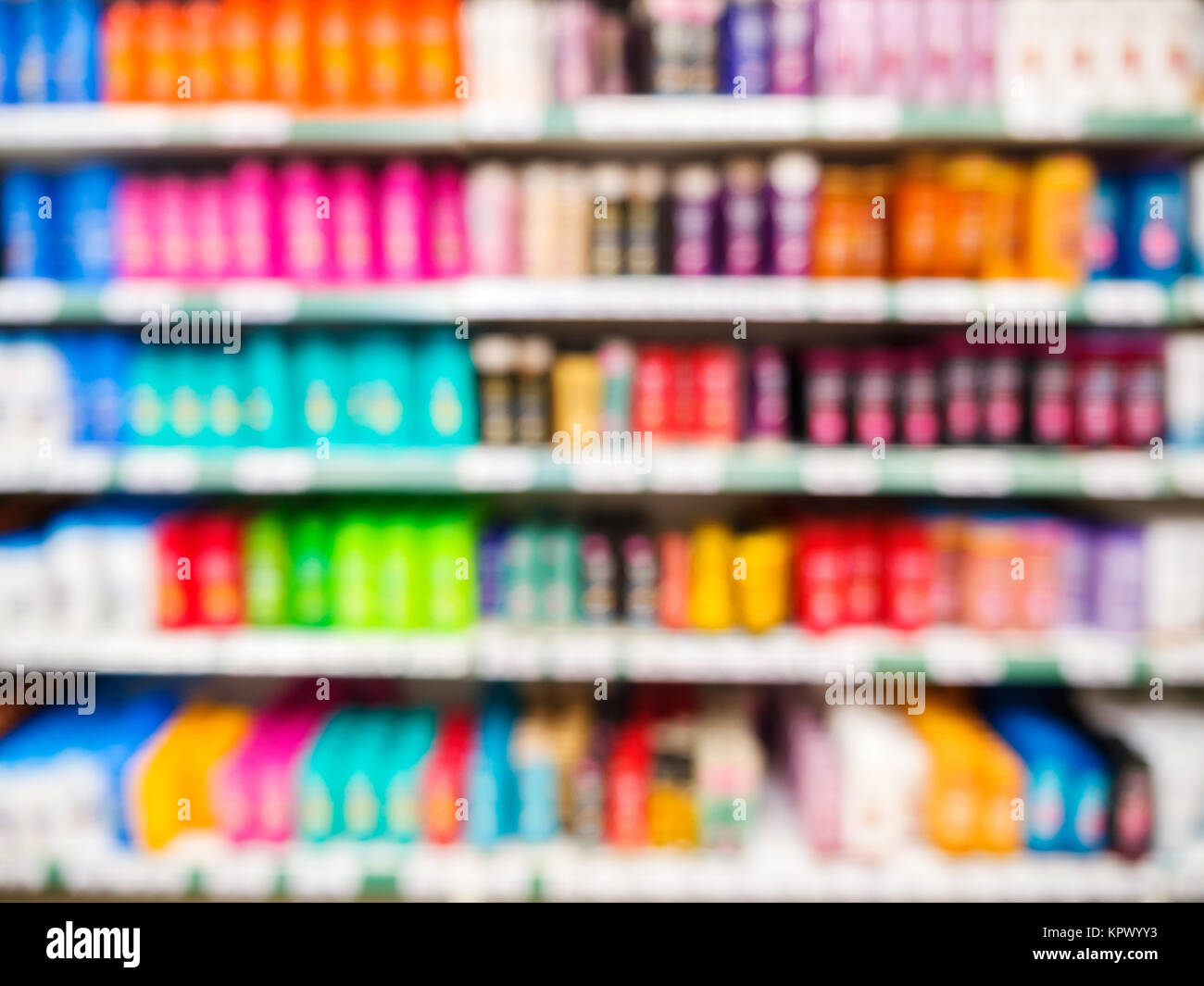 Blurred colorful supermarket products on shelves Stock Photo - Alamy