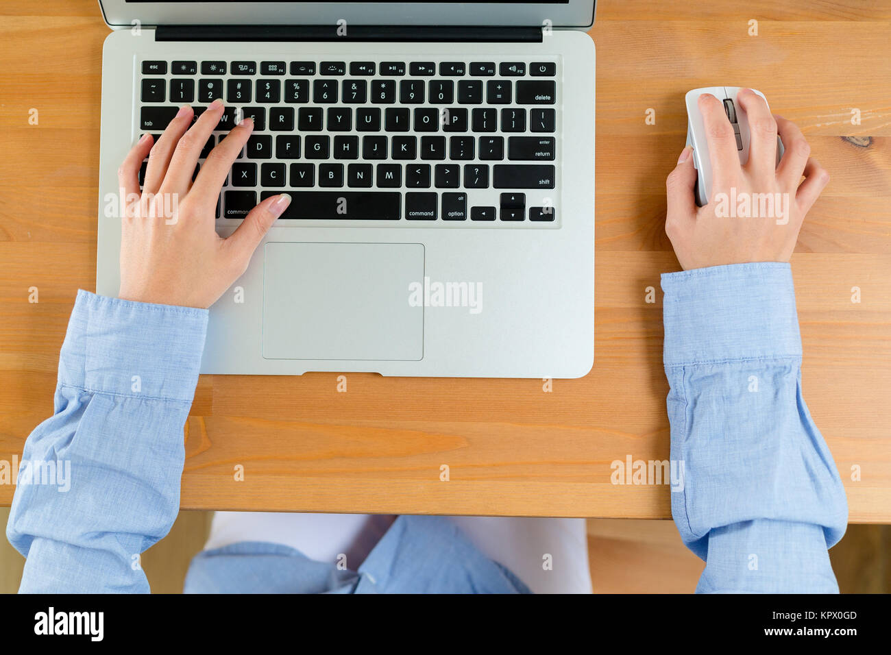 Top view of woman use of notebook computer Stock Photo - Alamy