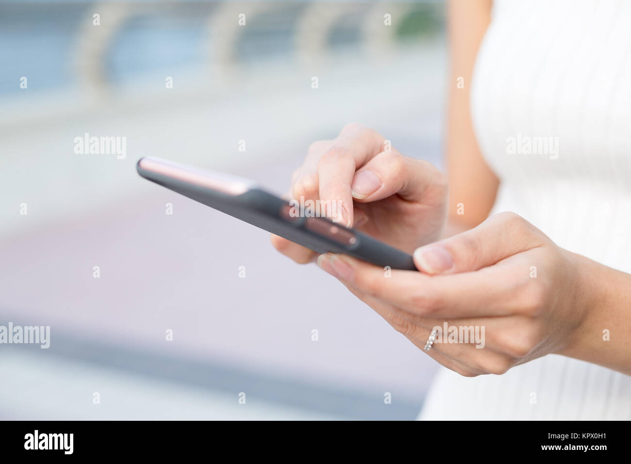 Hands holding smartphone Stock Photo - Alamy