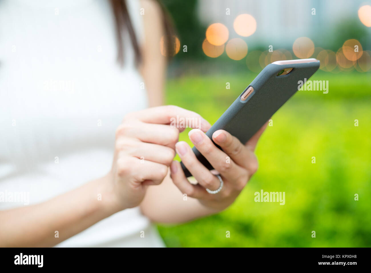 Girl use of mobile phone Stock Photo - Alamy