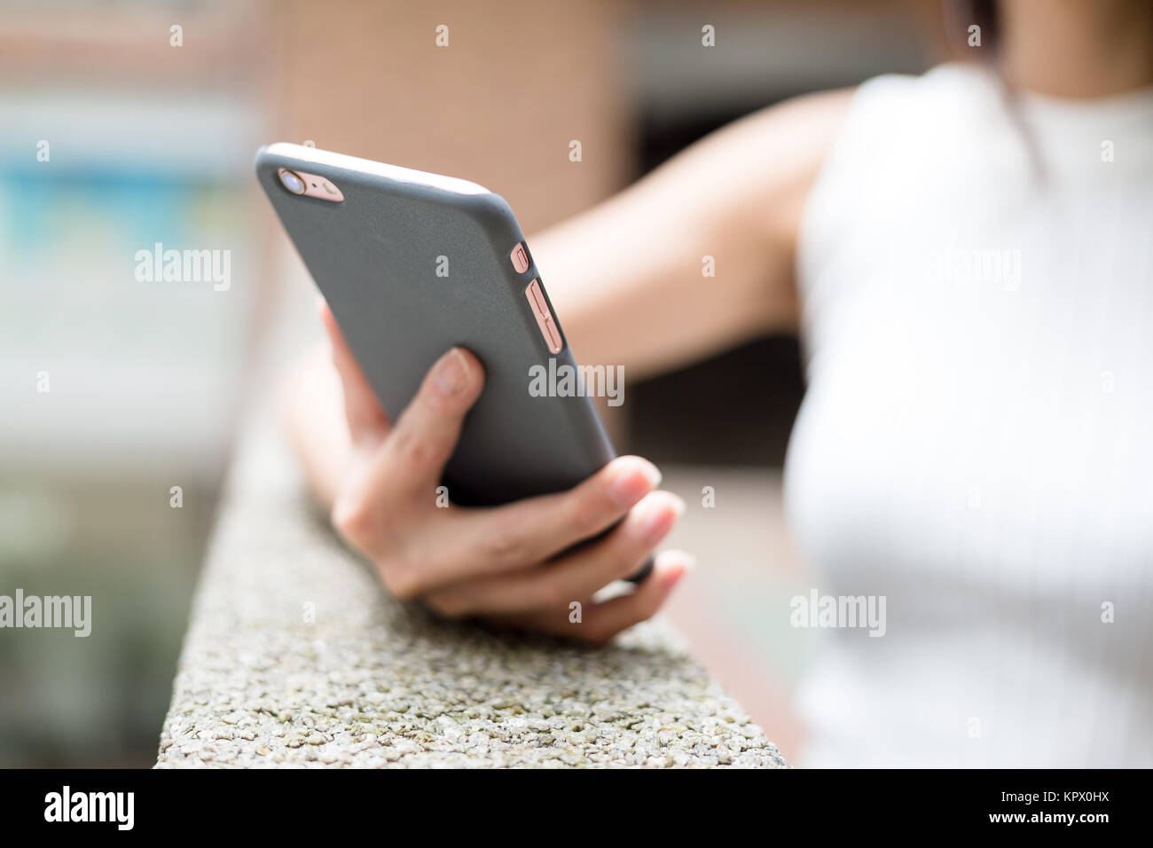 Woman hold with phone Stock Photo - Alamy