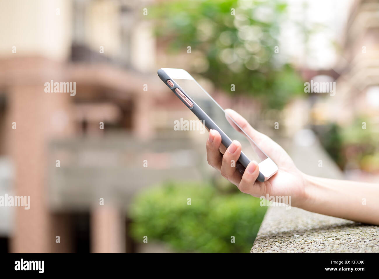 Woman hold with cellphone Stock Photo - Alamy