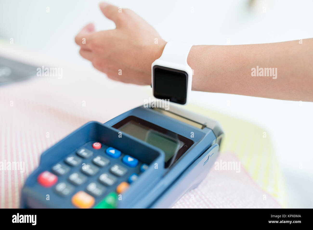 Contactless payment using smartwatch hi-res stock photography and ...