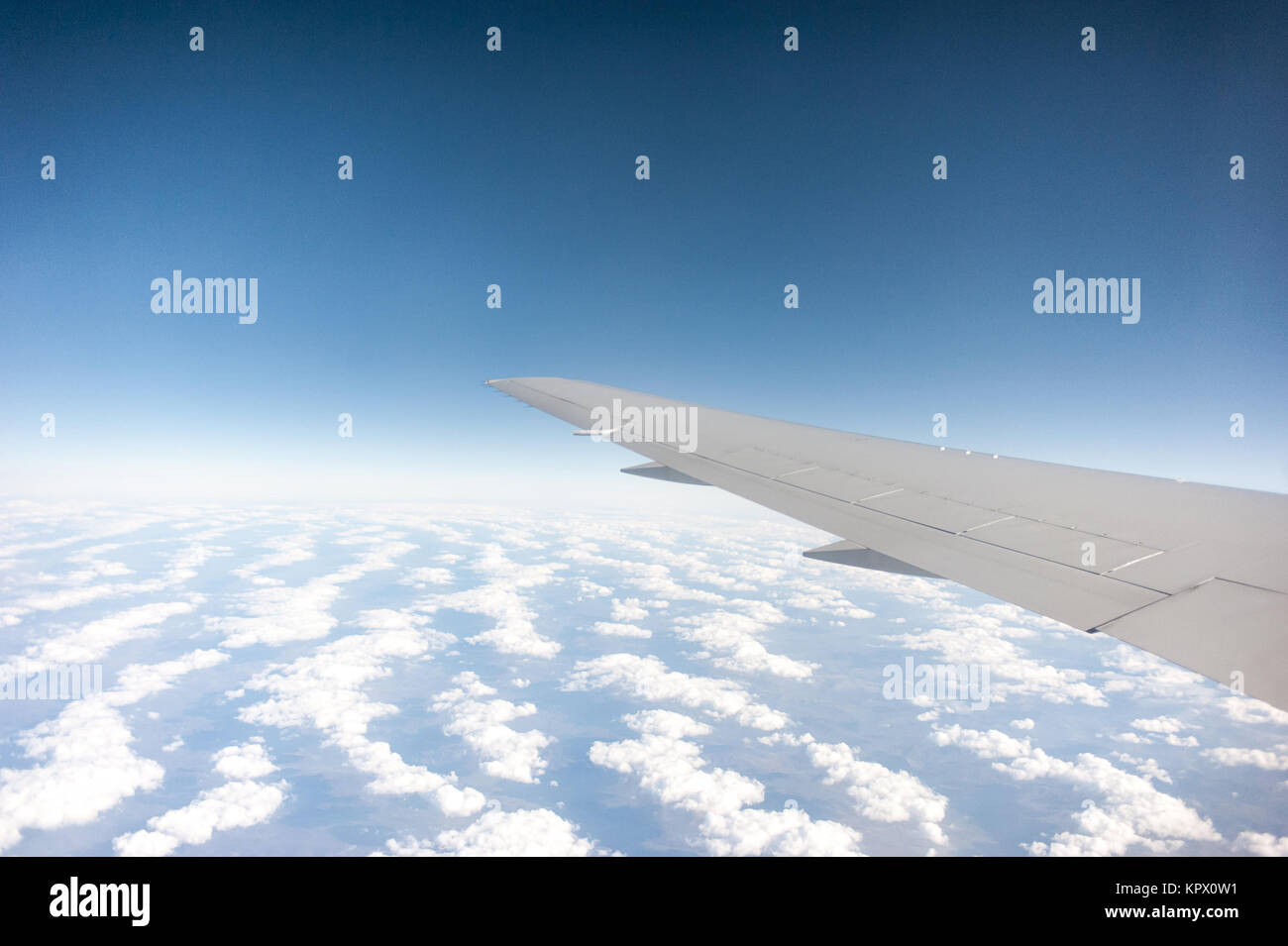 under wing, the clouds, view from window Stock Photo - Alamy