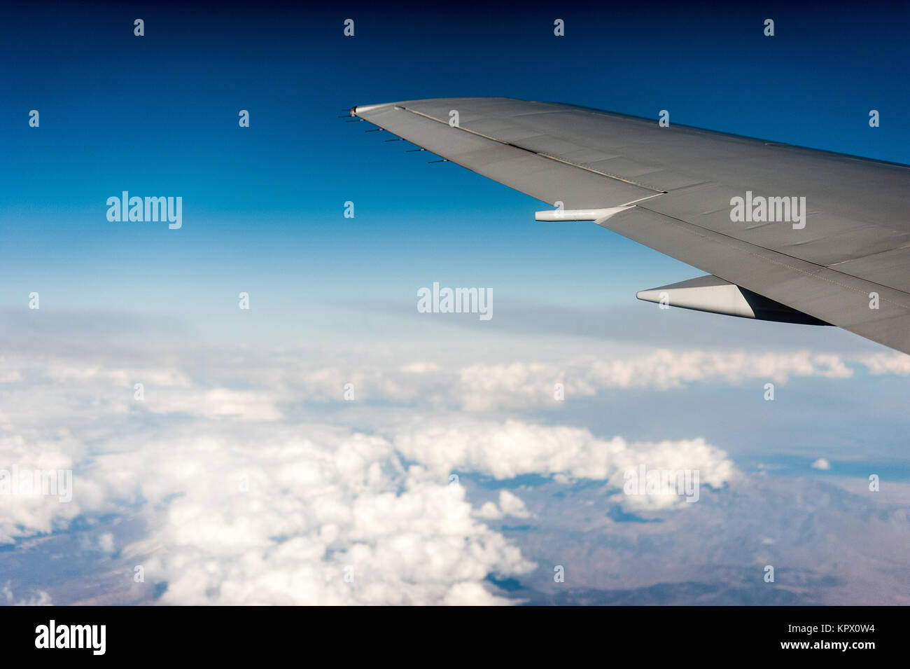 under wing, the clouds, view from window Stock Photo - Alamy