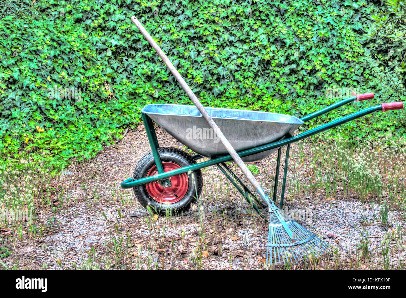 hdr of wheelbarrow in a garden Stock Photo - Alamy