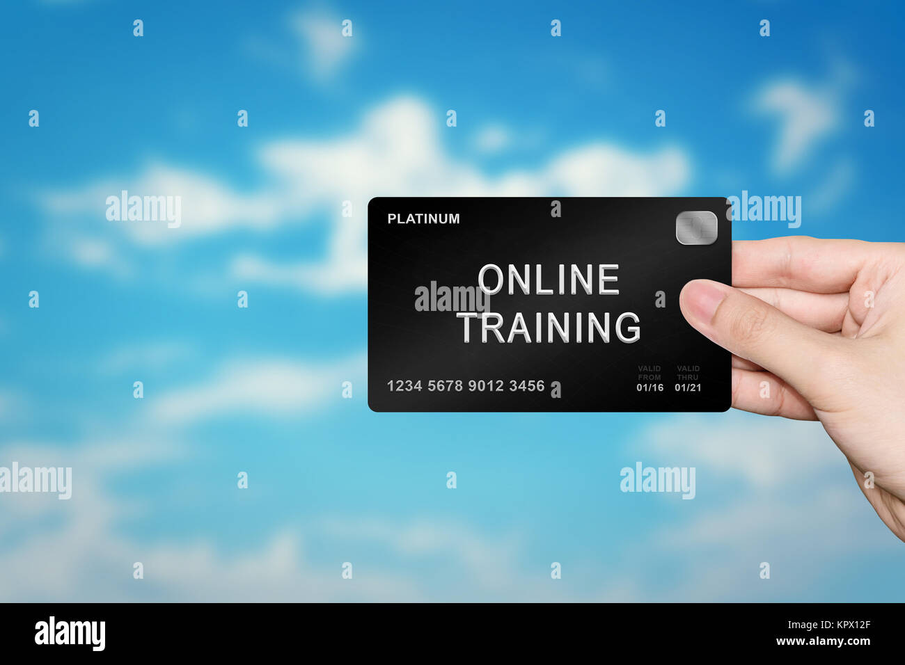 hand picking online training platinum card Stock Photo - Alamy