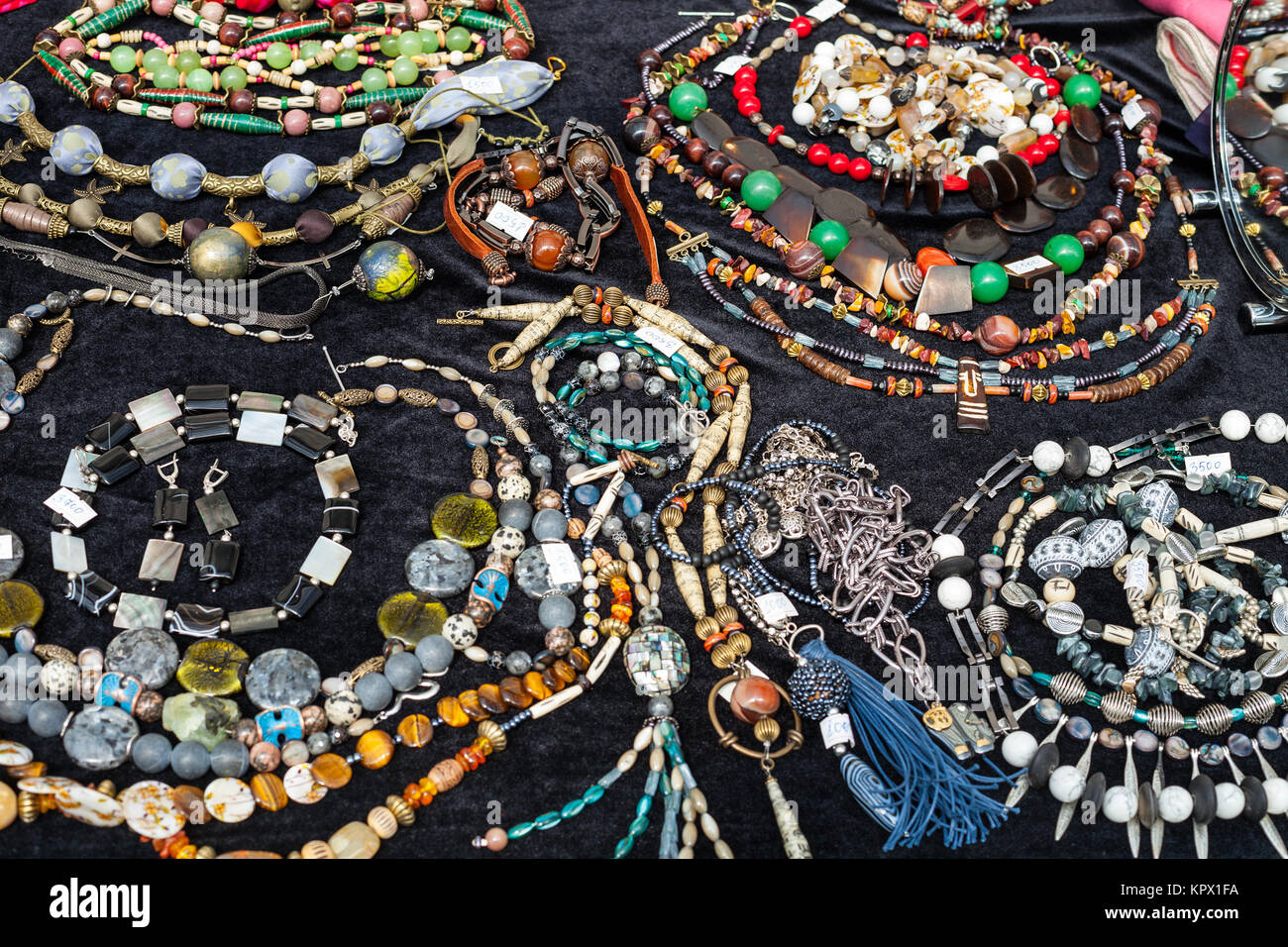 table with necklaces from natural gemstones Stock Photo - Alamy