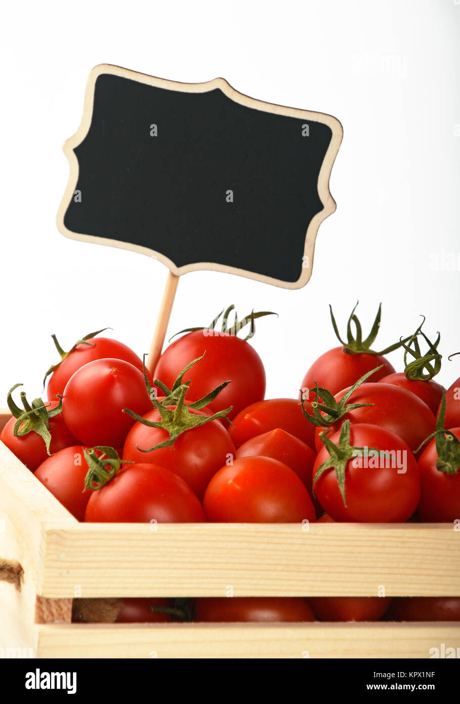 Red tomatoes with price sign over white Stock Photo - Alamy
