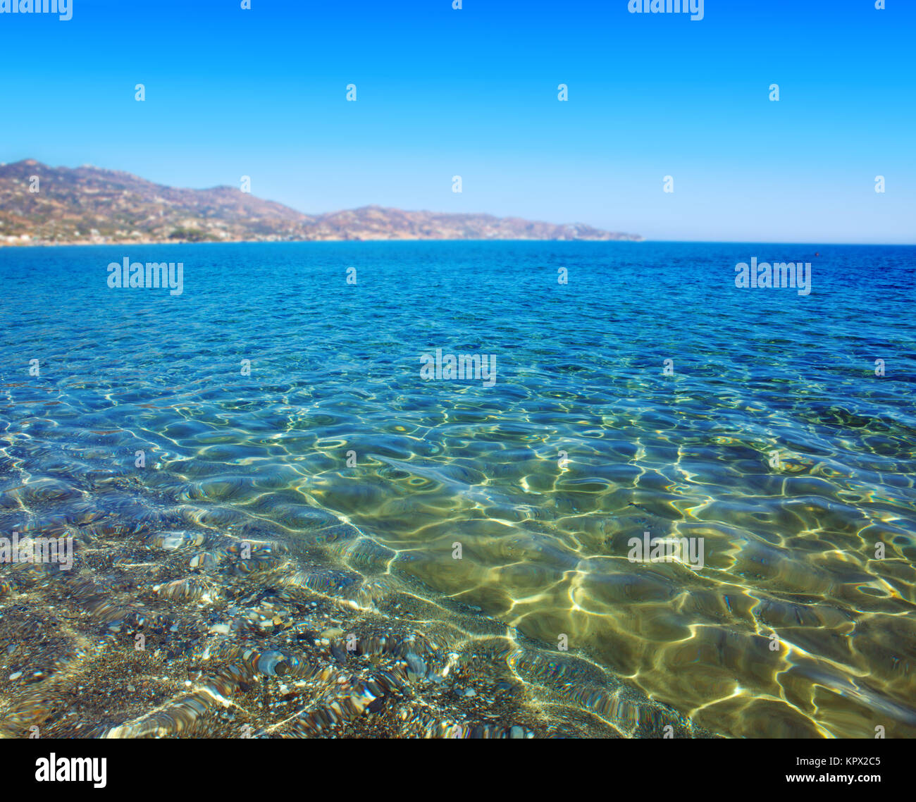 Clear water background, blue natural texture.Shining blue water ripple ...