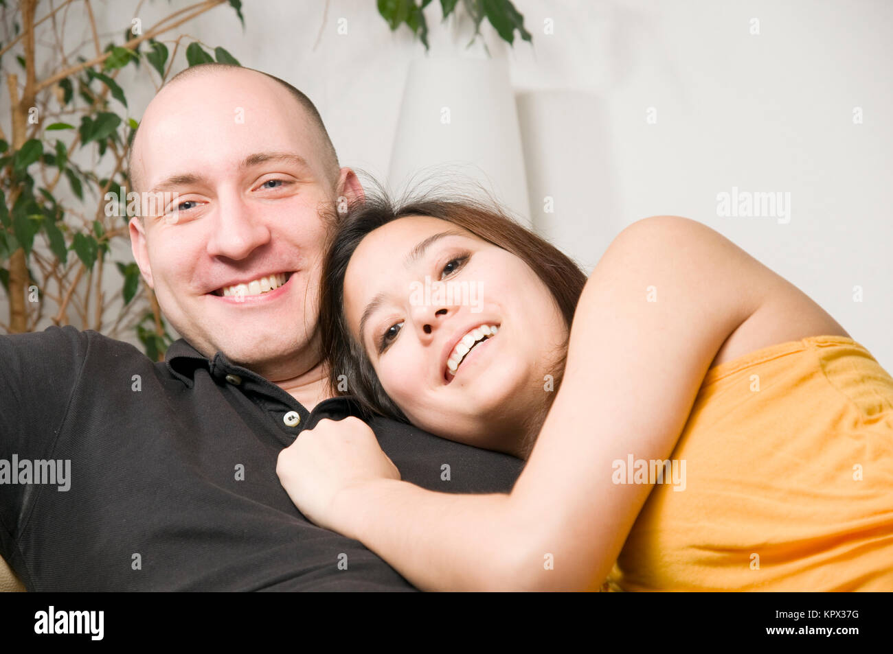 arm in arm at home Stock Photo - Alamy