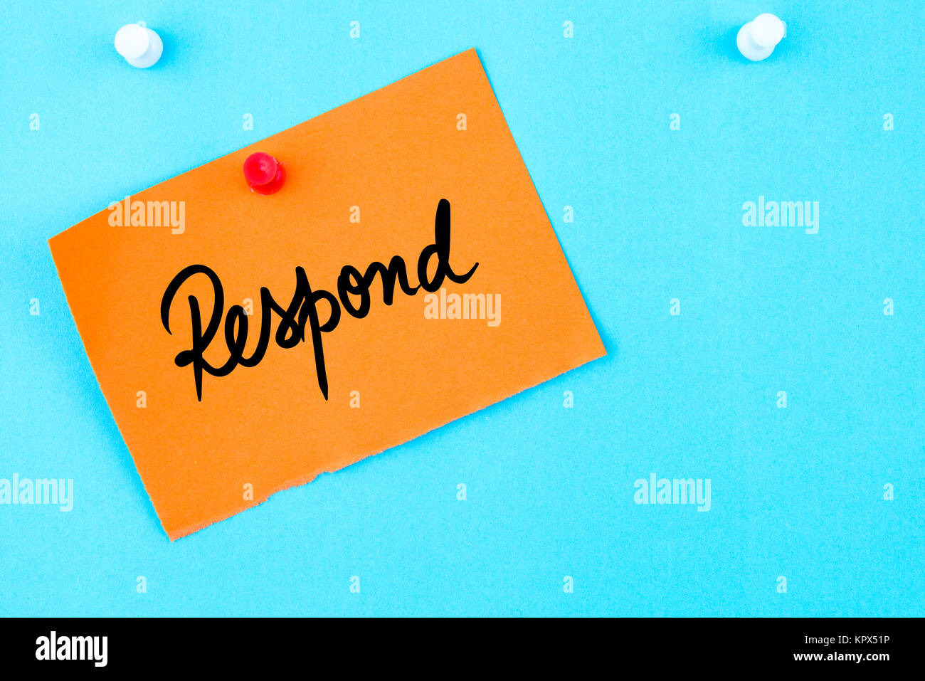 Respond written on orange paper note Stock Photo - Alamy