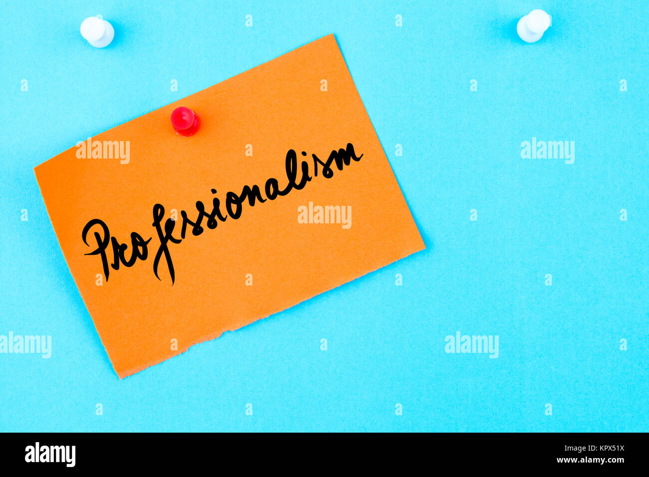 Professionalism written on orange paper note Stock Photo - Alamy