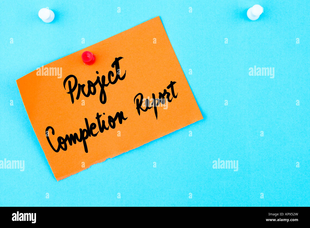 Project Completion Report written on orange paper note Stock Photo - Alamy