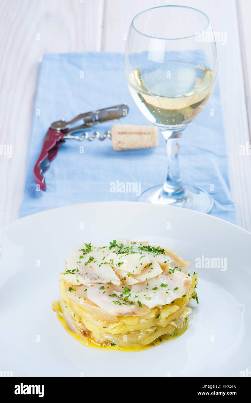 Oven baked cod fish with potatoes Stock Photo - Alamy