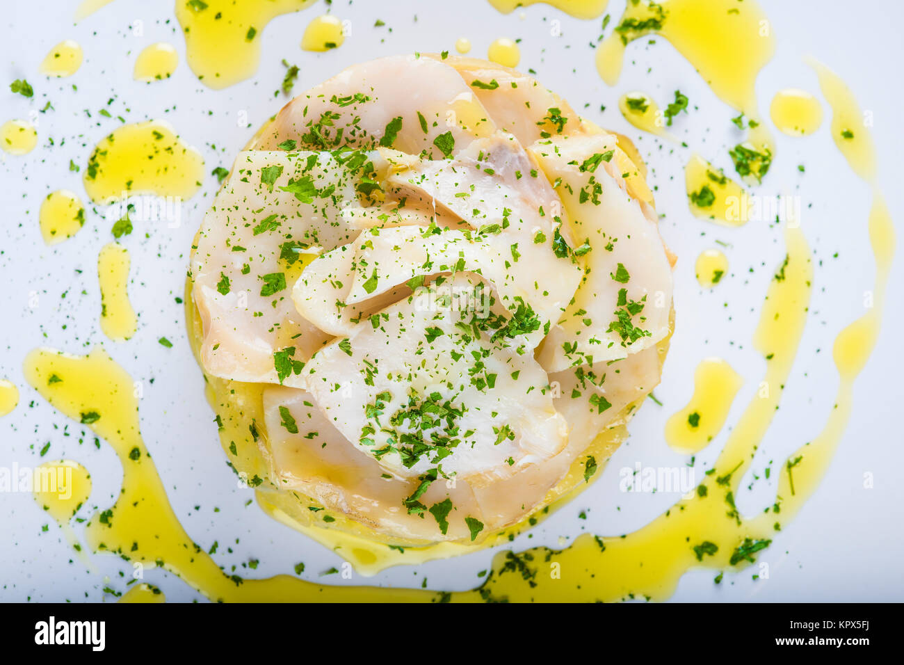 Oven baked cod fish with potatoes Stock Photo - Alamy