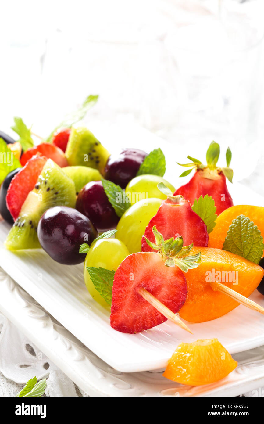 Fruits on sticks Stock Photo - Alamy
