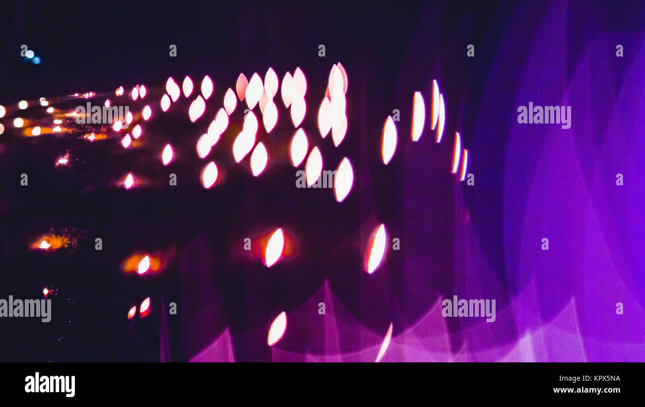 candles at night on grassland tilt shift effect Stock Photo - Alamy