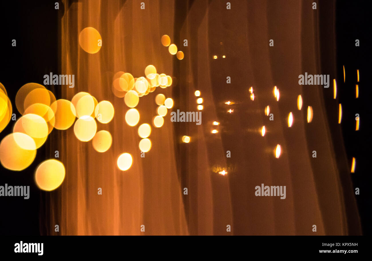 candles at night on grassland tilt shift effect Stock Photo - Alamy