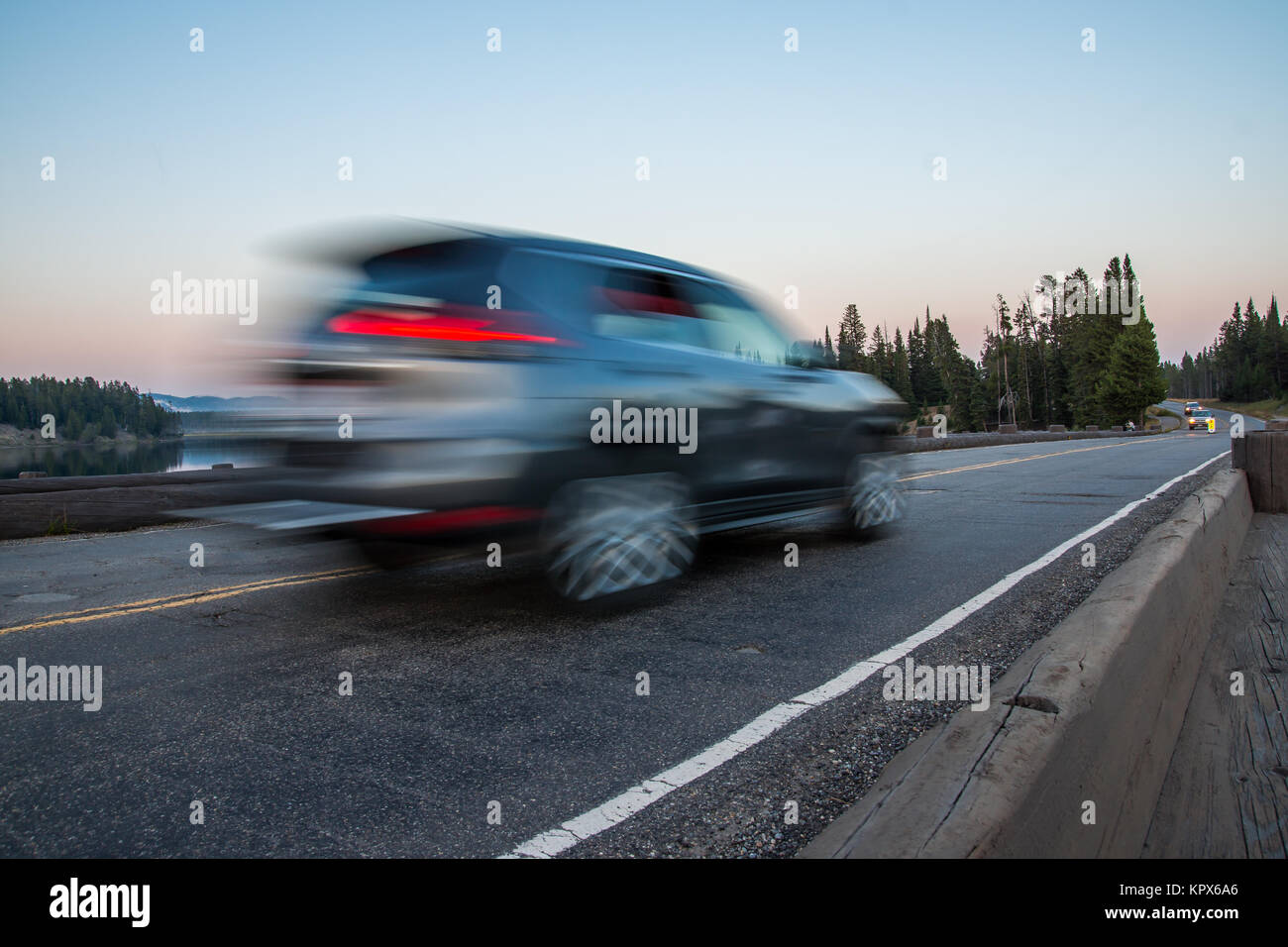 Car passing over a bridge Stock Photo - Alamy