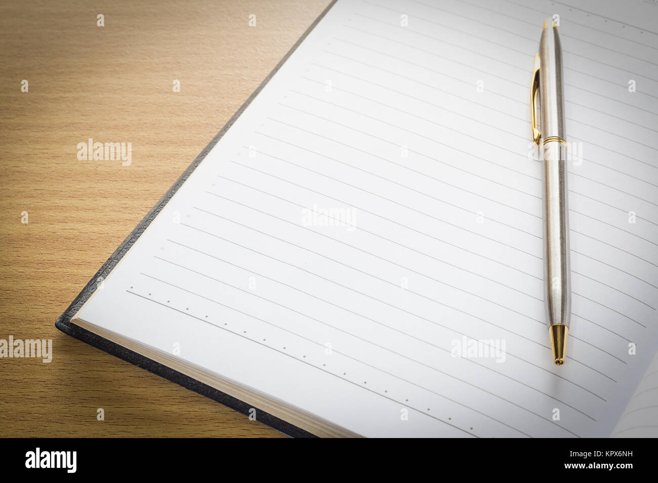 Pen and open note book with blank page Stock Photo - Alamy