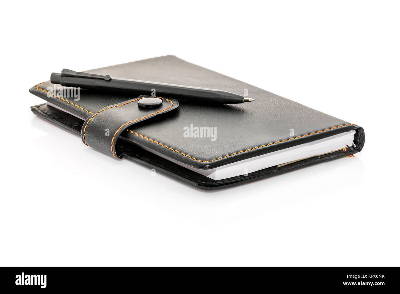 Pen put on the notebook Stock Photo - Alamy