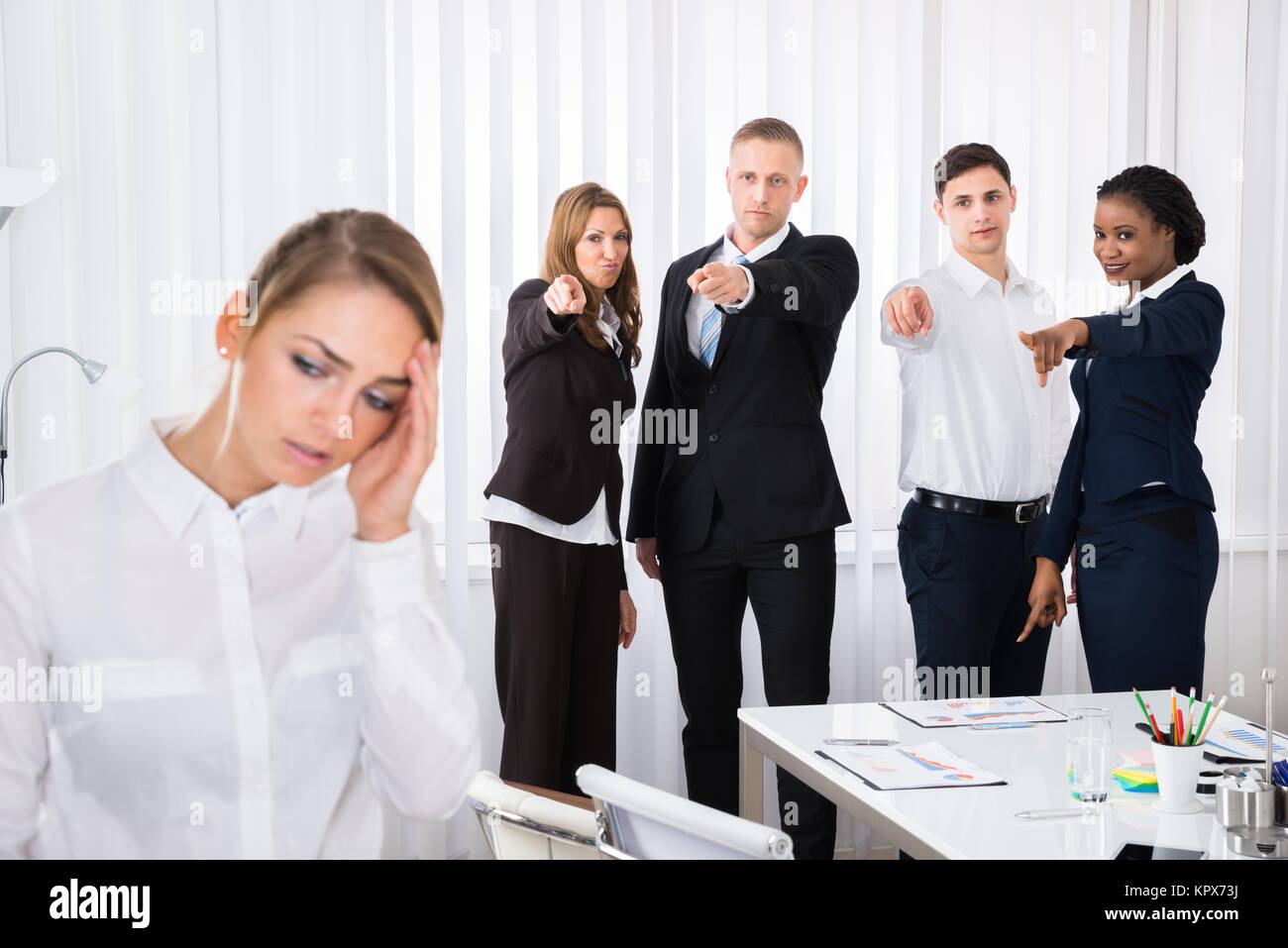 Frustrated Female Colleague In Office Stock Photo - Alamy